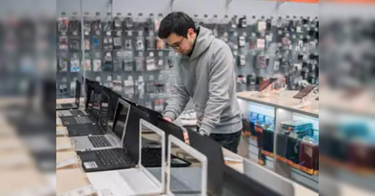 India Laptop Imports: India plans laptop import curbs to boost Apple ...